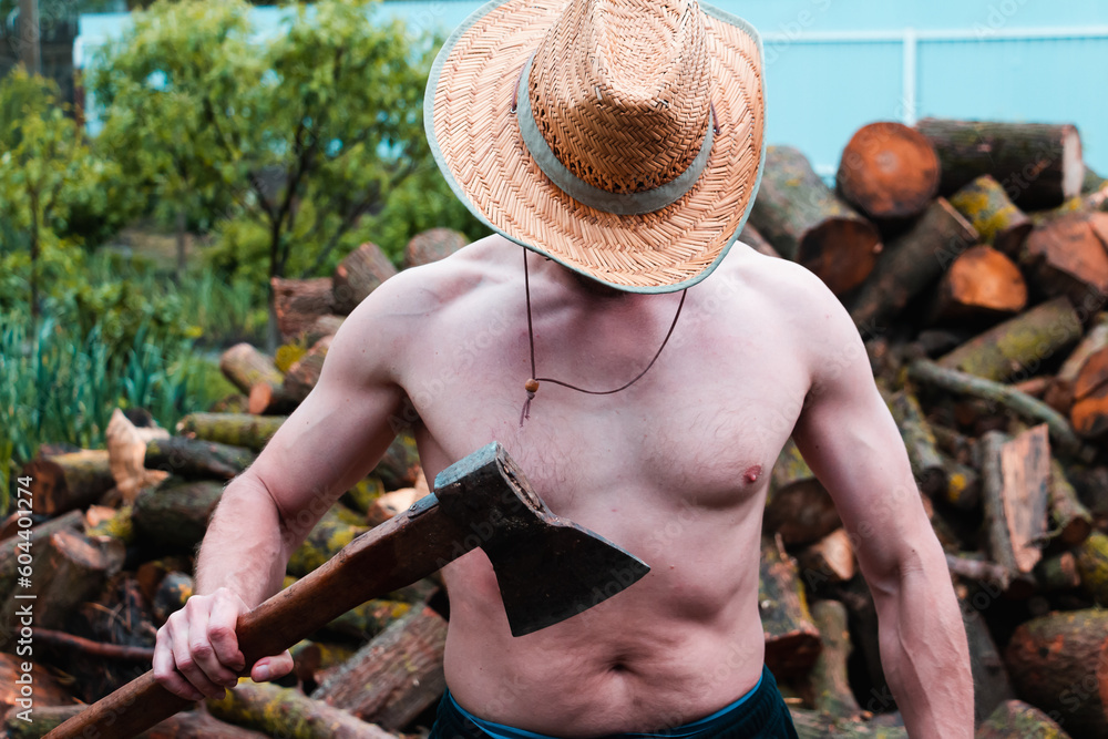 Woodcutter or lumberjack with the axe with wooden handle. The hatchet ...