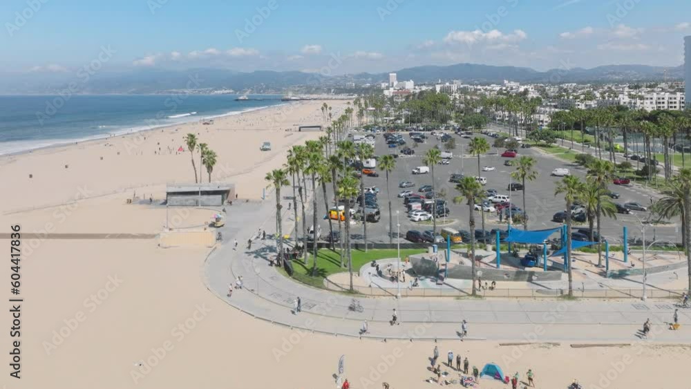 Roller skating path sandy Santa Monica beach background. Athletic ...