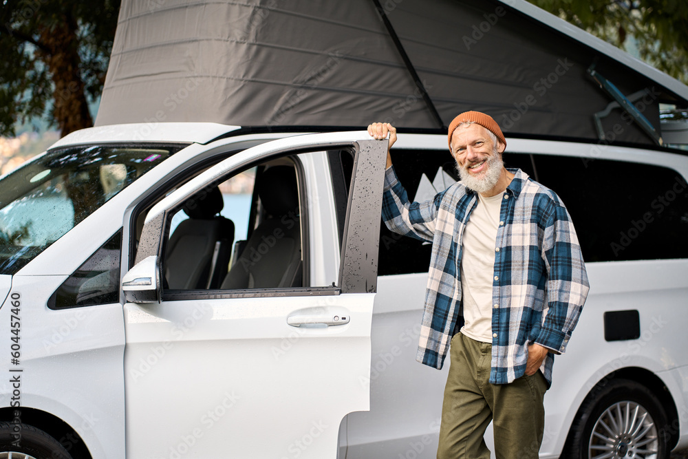 Happy older man standing with rv camper van on travel vacation. Smiling ...