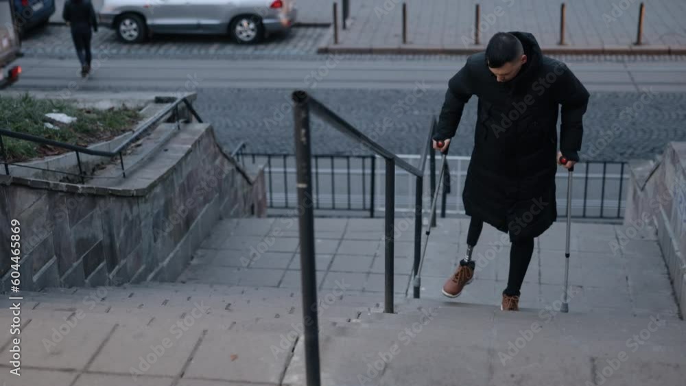 Determined step, Orthotic support, Disabled community. City street has ...