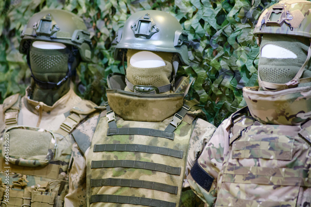 Military uniform on a mannequin as a sample for sale in a store. An ...