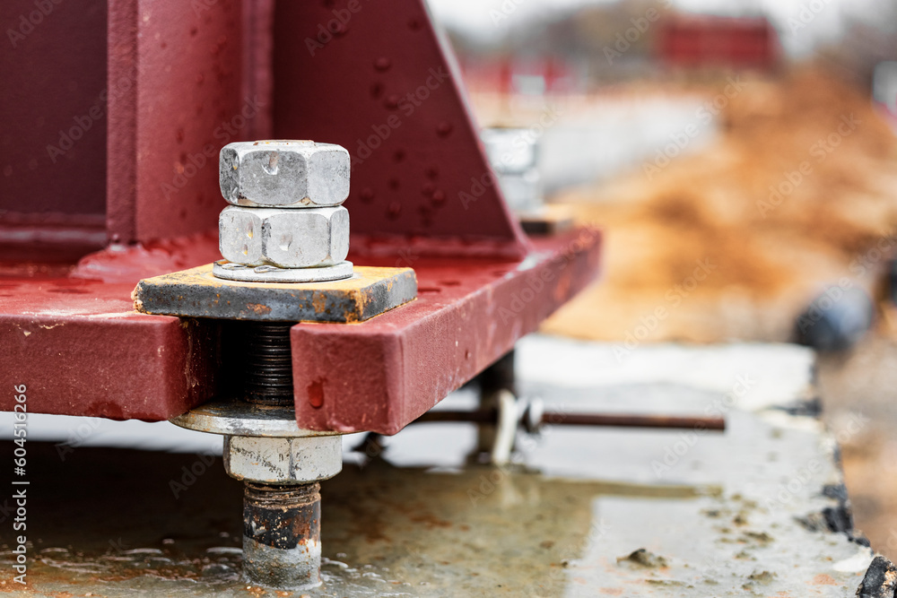 Installation of a metal column for an industrial building. Mounting ...