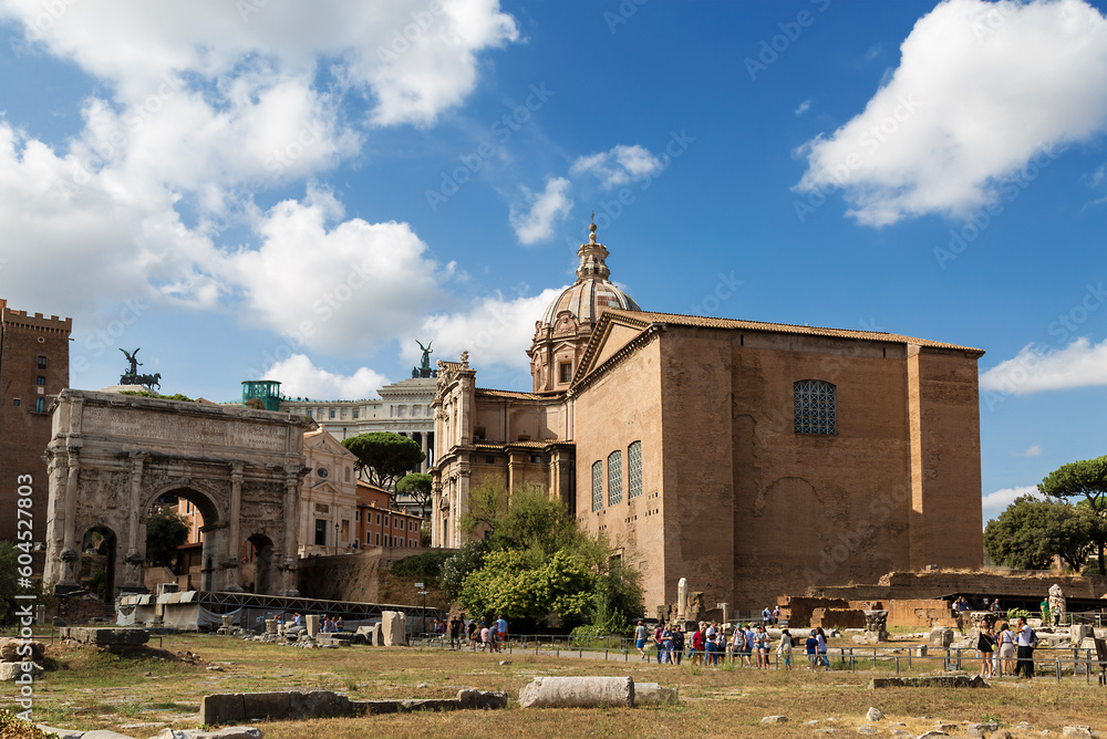The Roman Forum with the curia building, the triumphal arch of ...