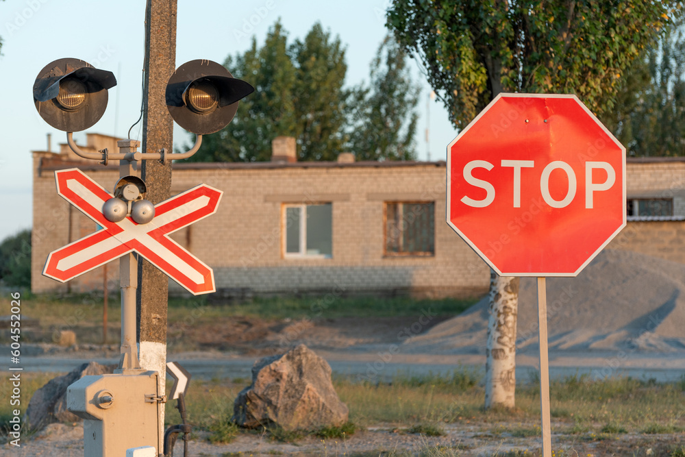 STOP sign near the railway crossing. Rules of the road. Level crossing ...