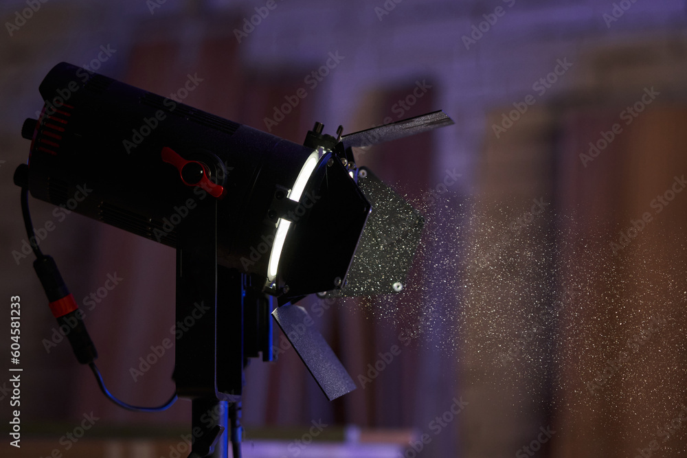 rays of dust and small particles are visible in the beam of directional ...