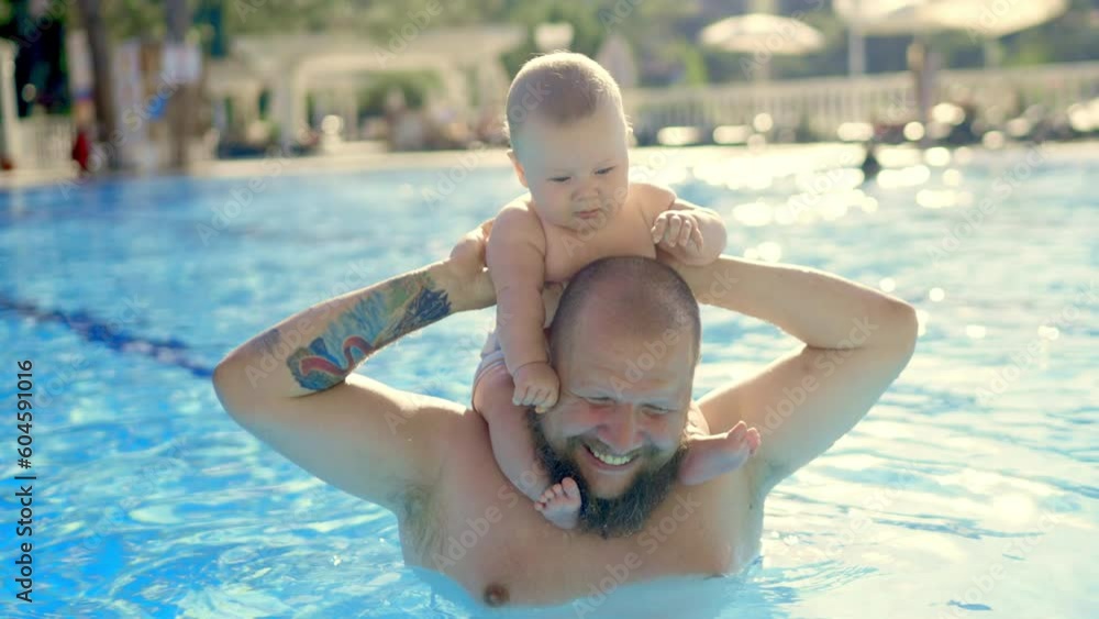 Vídeo do Stock: Cute baby having swimming lesson with his mother and ...