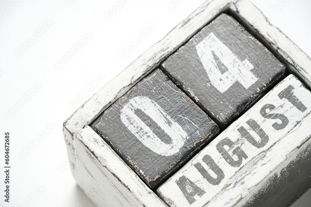 August 04, wooden calendar with cubes on a white background.U.S. Coast ...