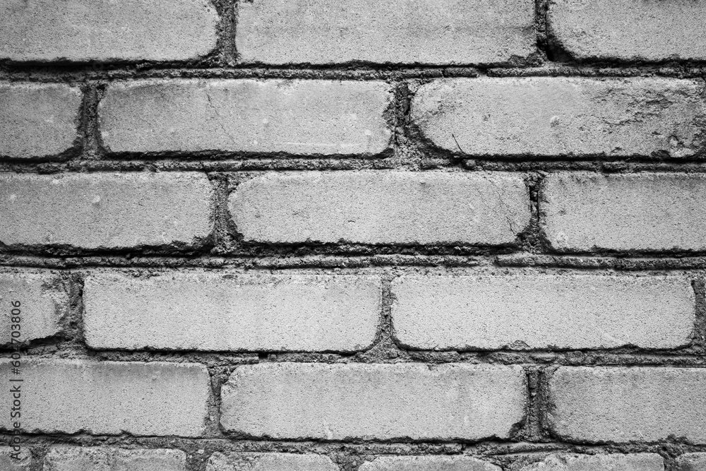 Wall made of old colorless bricks. Dilapidated brick wall black and ...