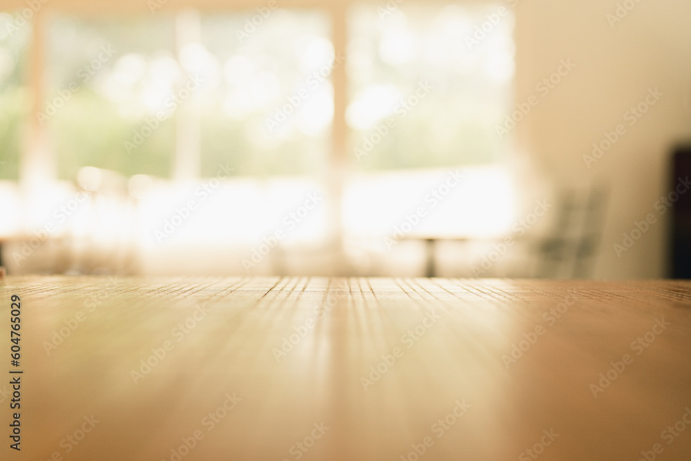 Wood table with blur kitchen room background .For montage product ...