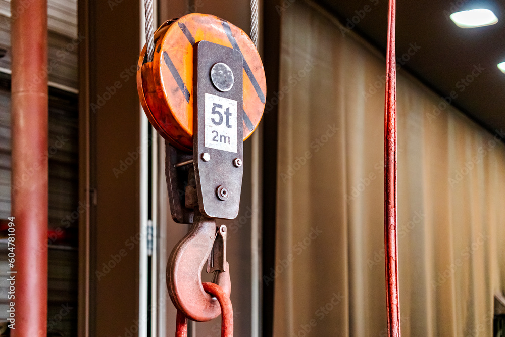 Metal industrial chains with hooks in the workshop of a metallurgical ...