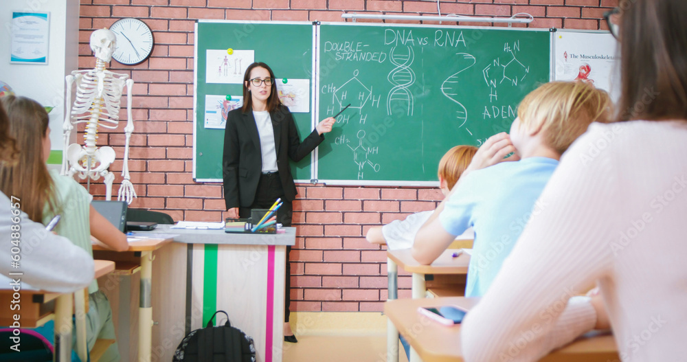 Attractive woman in black suit and glasses DNA and RNA peculiarities ...