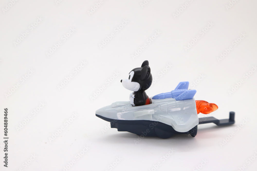 Mickey Mouse flying in spaceship on isolated white background. Mickey ...