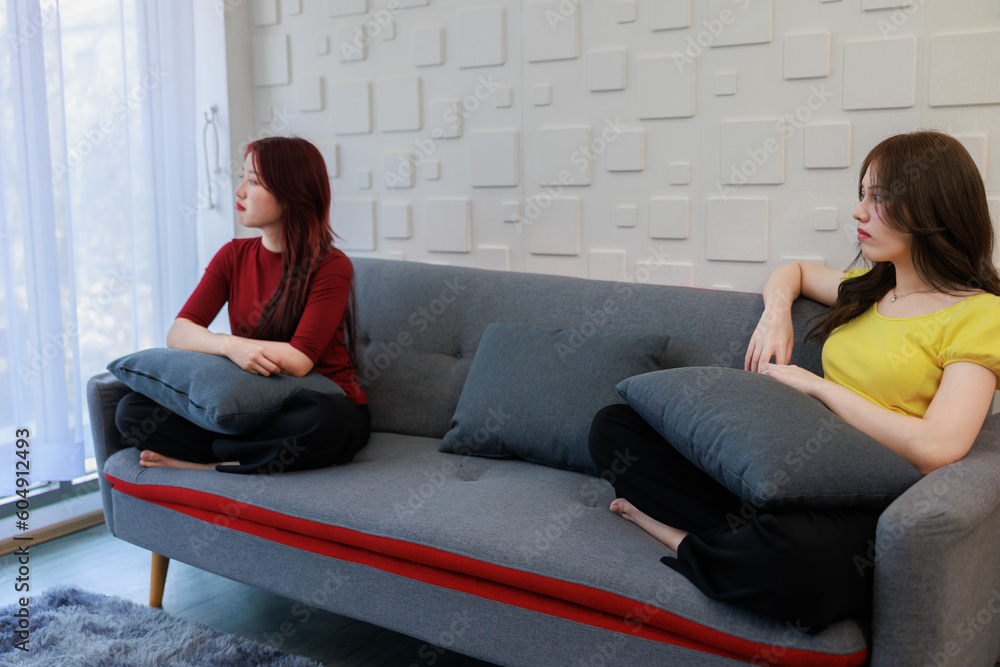 Foto de Female couple get feeling hurt about their relationship. Two ...