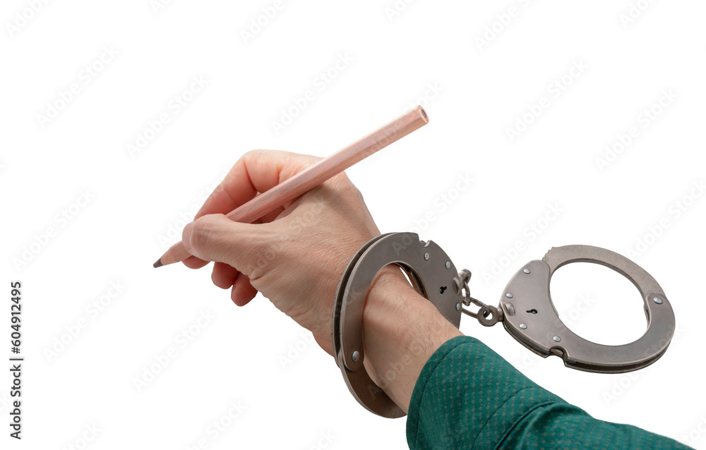 Hand in handcuffs fill out protocol, confession. Arrest, bail, criminal ...