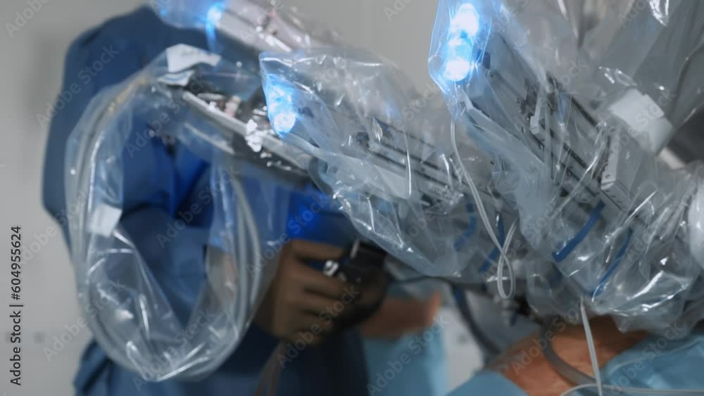 Robotic arms of advanced medical robot move inside patient body in ...