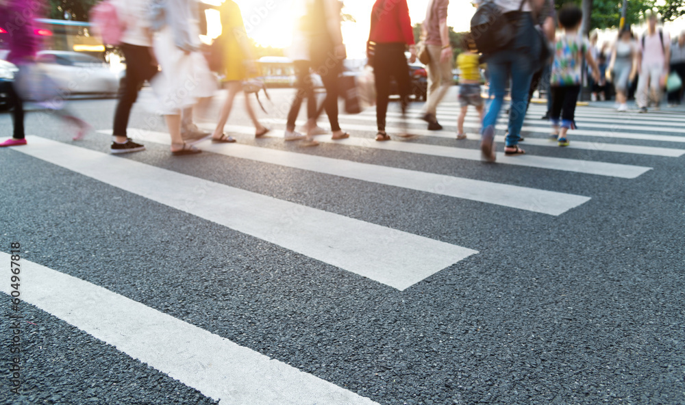 Group of people walking on the crosswalk Stock Photo | Adobe Stock