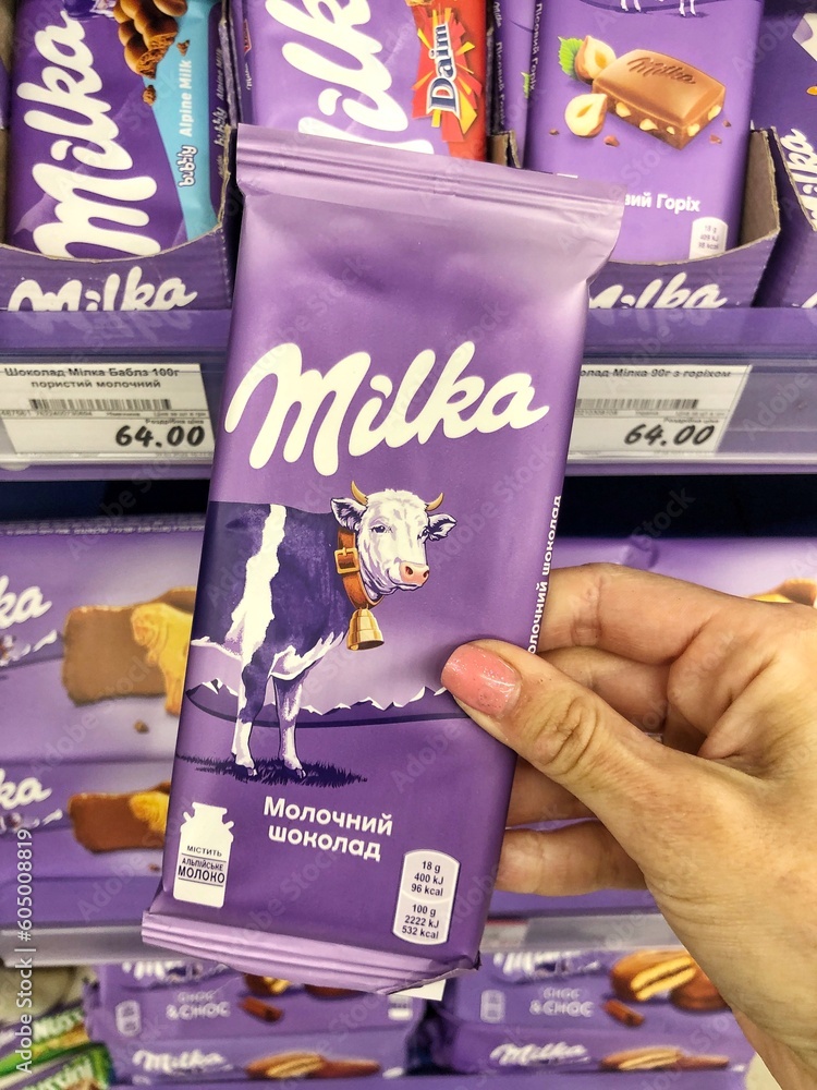 28.04.2023, Ukraine, Kharkiv, Milka chocolate on store shelves. Many ...