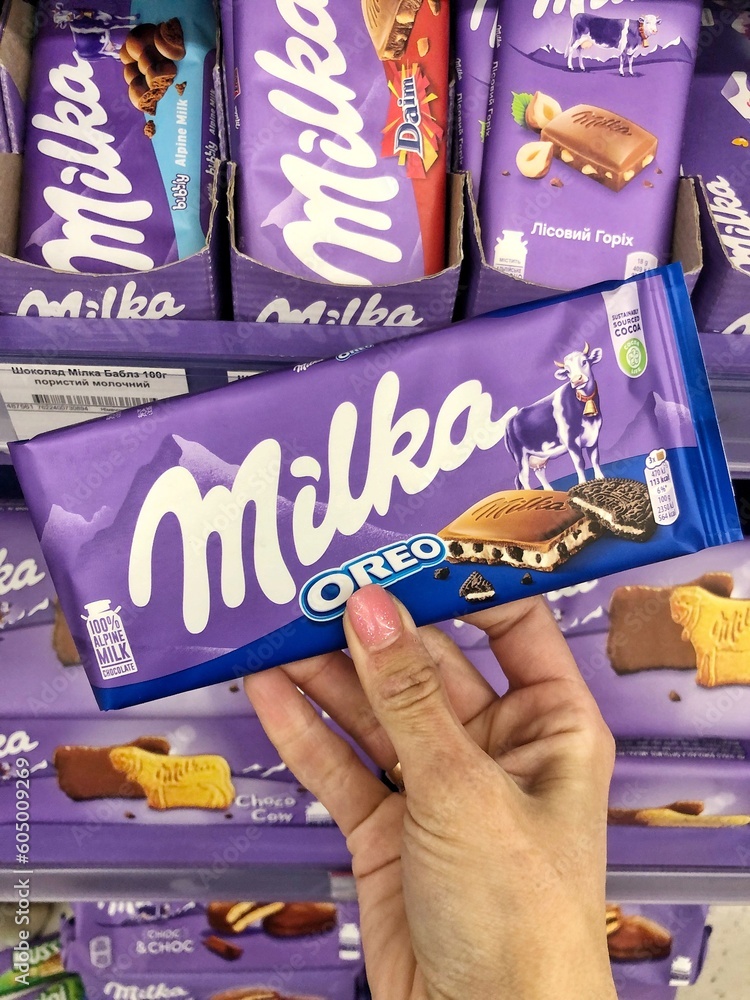 28.04.2023, Ukraine, Kharkiv, Milka chocolate on store shelves. Many ...