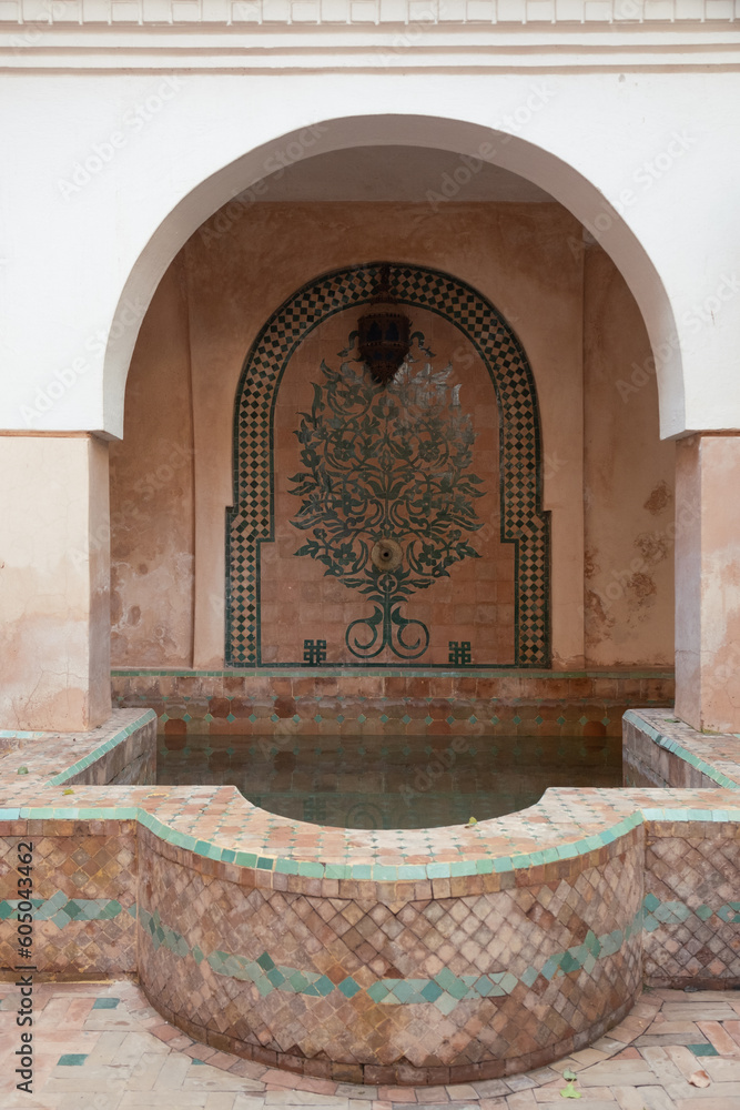 Moroccan indoor bath or pools with moorish arches, arabic tiles and ...
