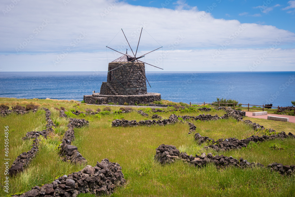 Corvo Island, Azores - Ancient stone mill by the coast Stock Photo ...