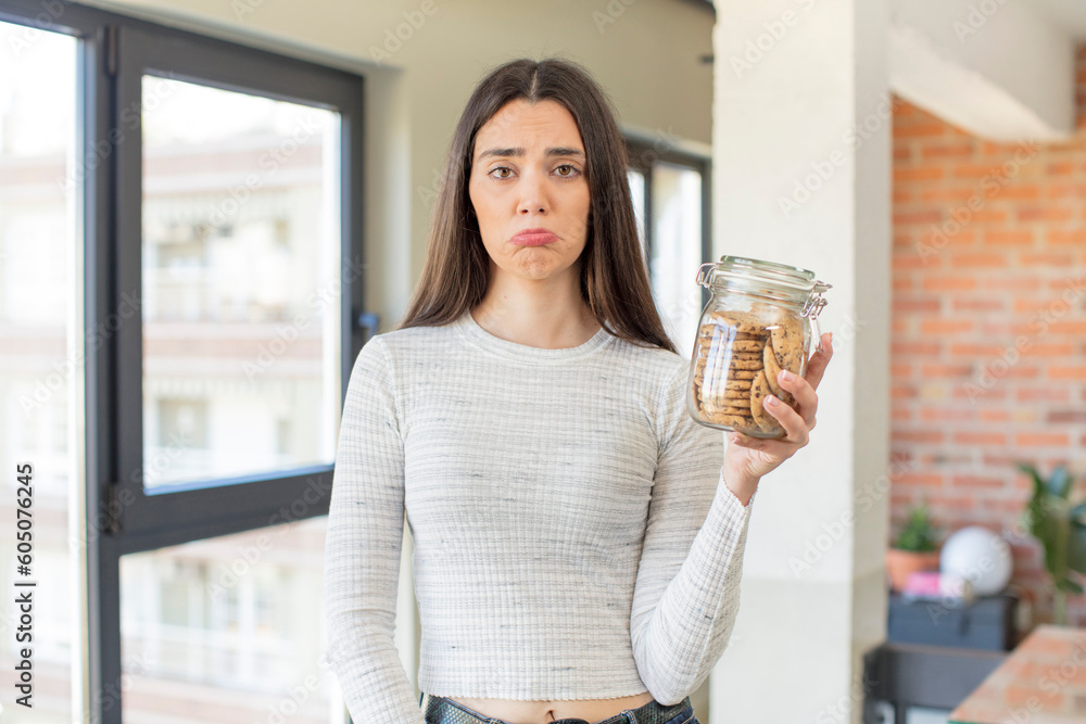 pretty young model feeling sad and whiney with an unhappy look and ...