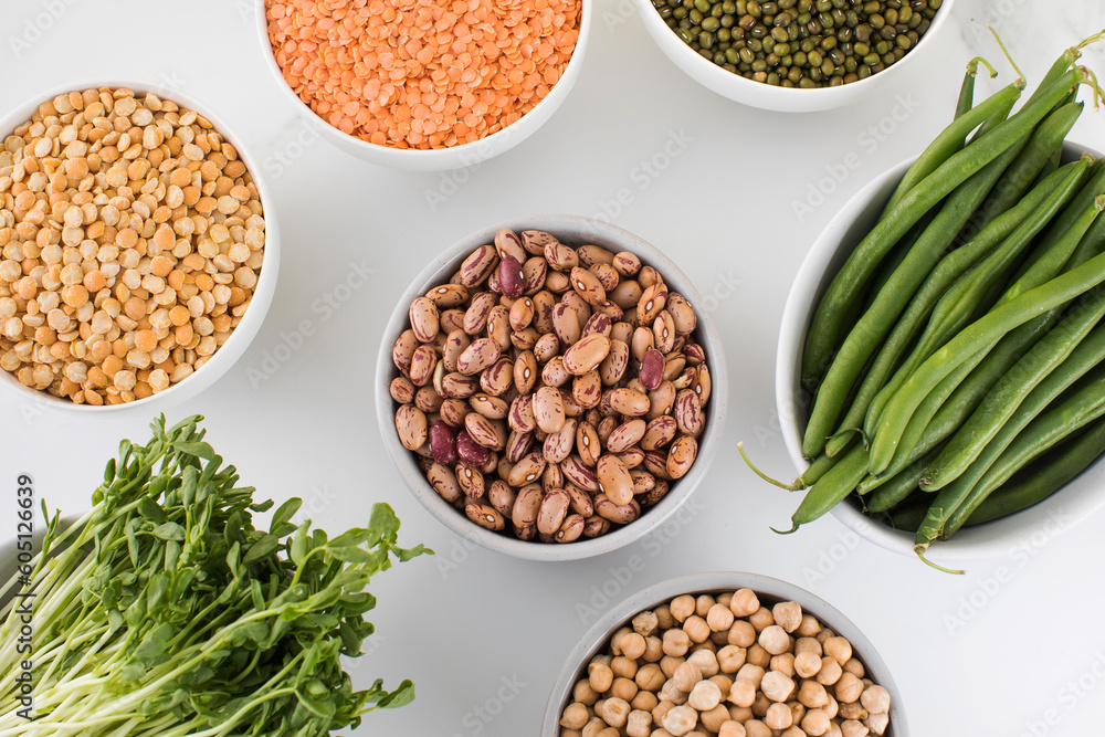 Legumes in glass jars top view. Vegetable protein, vegetarianism ...