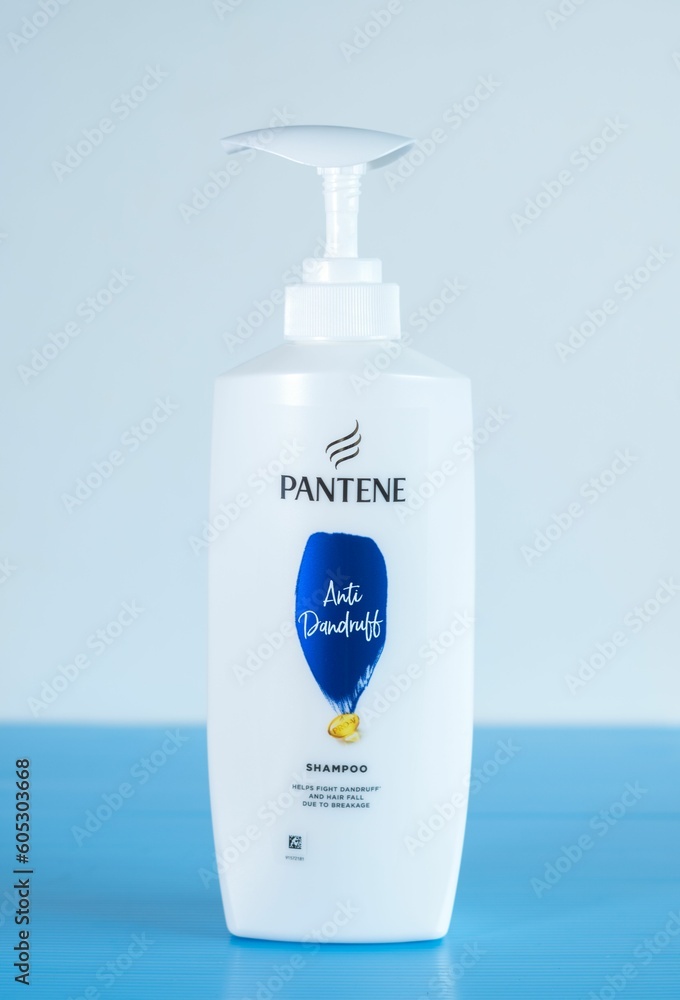 Vertical closeup of Pantene Shampoo (Anti-Dandruff) bottle isolated on ...