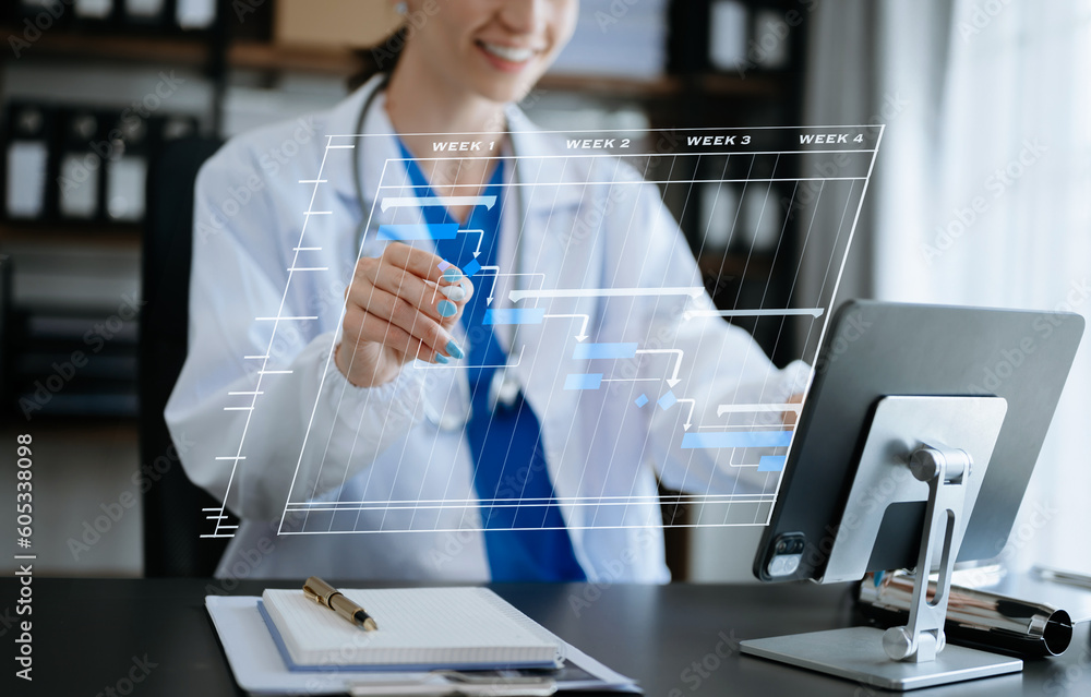 Project manager working and update tasks with Gantt chart scheduling ...