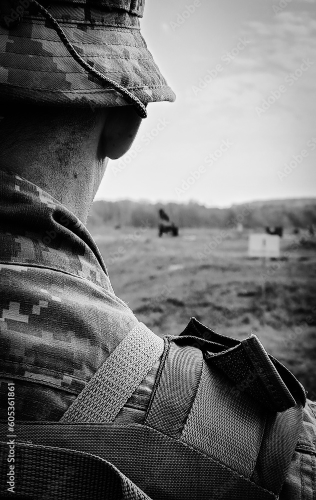 A Ukrainian military man soldier in a pixelated uniform and in a panama ...