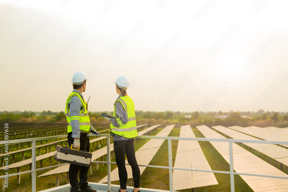 Engineers inspecting construction of solar panel at roof top. solar ...