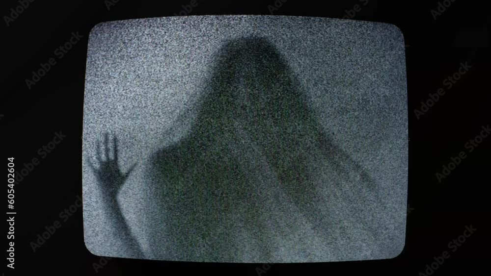 The ominous scary silhouette of a veiled ghost trapped inside an old ...