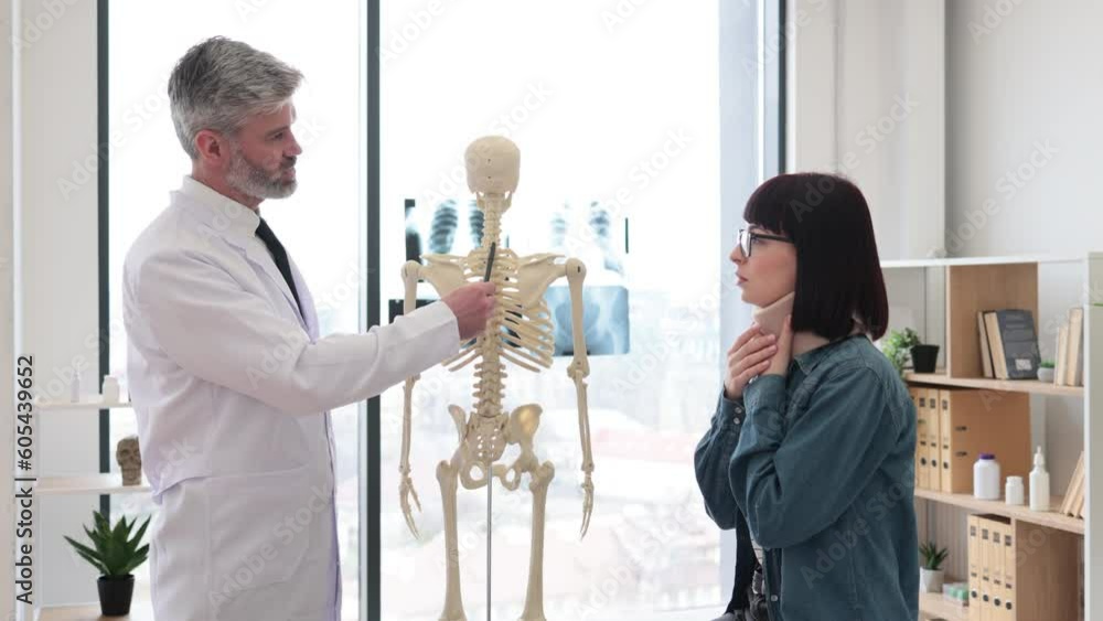 Attractive caucasian lady in casual outfit holding cervical collar ...
