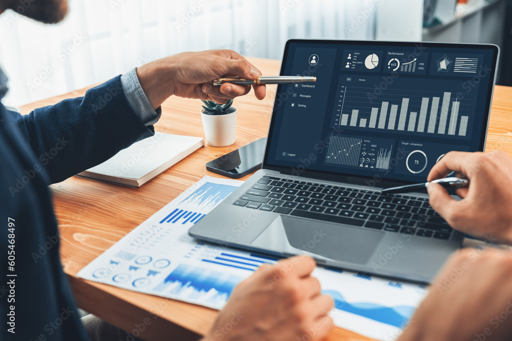 Busy analyst team in office analyzing financial data analysis for ...