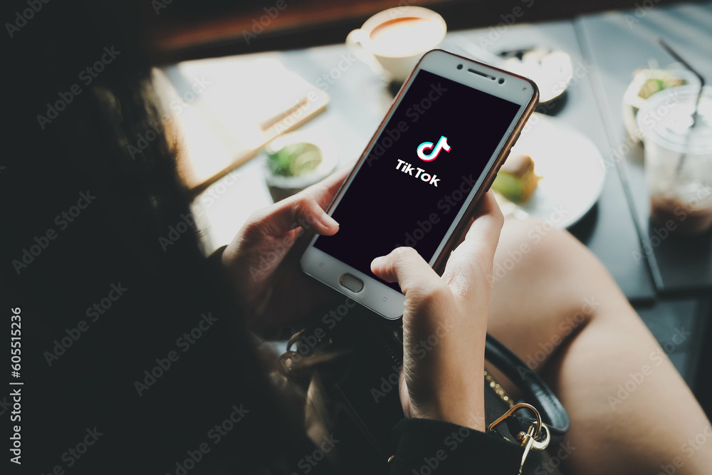 Bangkok. Thailand. MAY 24,2023 : woman using Phone showing Tik Tok ... Bangkok. Thailand. MAY 24,2023 : woman using Phone showing Tik Tok ...