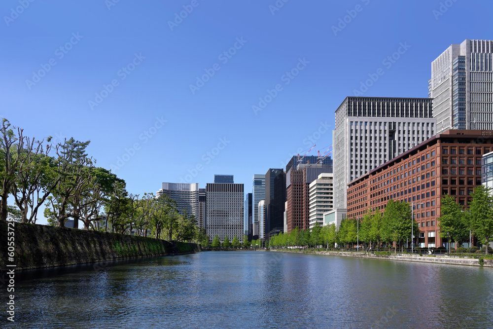 In April 2023, fresh greenery in Tokyo, high-rise office buildings in ...