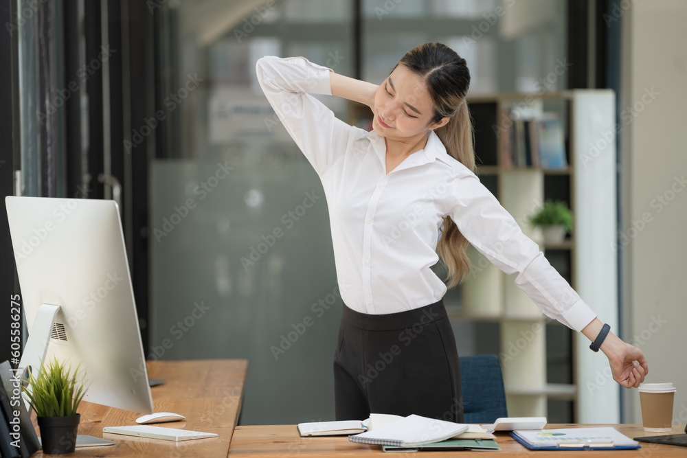 Businesswomen or working lady is stretch themselves or lazily for ...