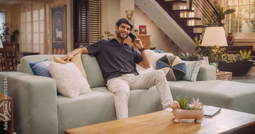 Young Indian Man Talking on Phone with Family, Friends or Clients. Smiling, Happy and Charming ...