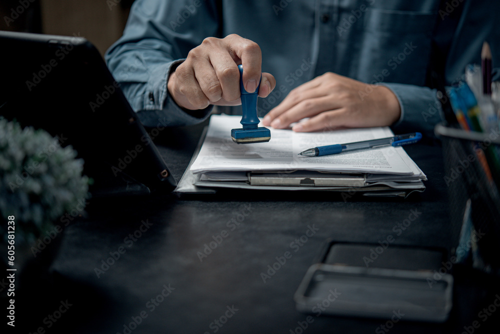 hand stamping with approved stamp on certificate document Contract Form ...
