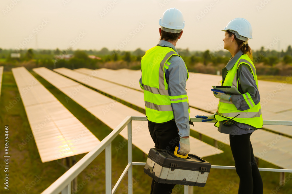 Engineers inspecting construction of solar panel at roof top. solar ...