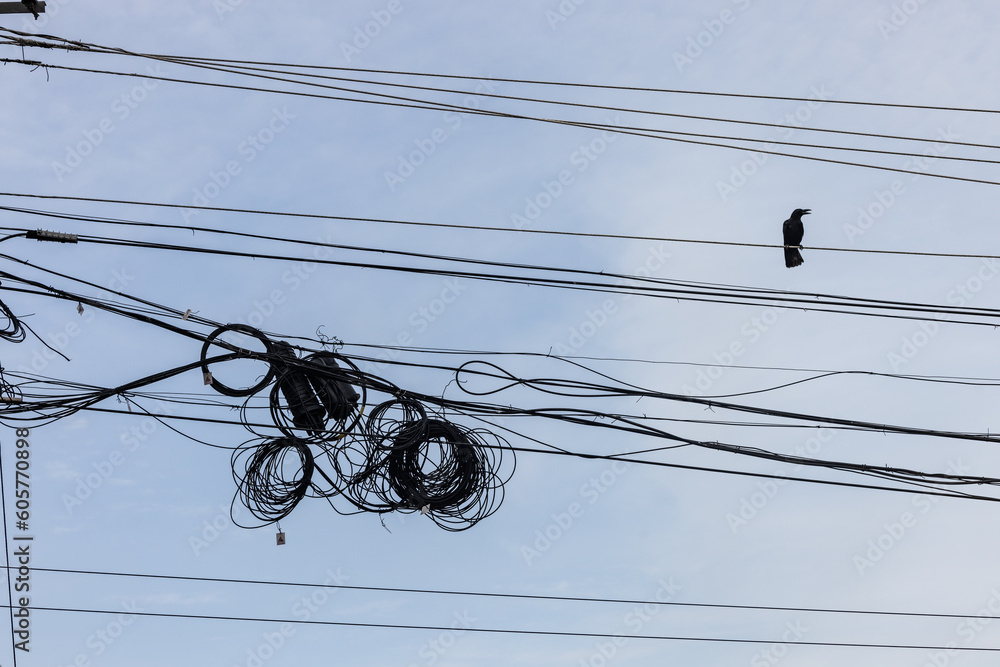 messy chaos wires cables , telephone and internet fiber signal line on ...