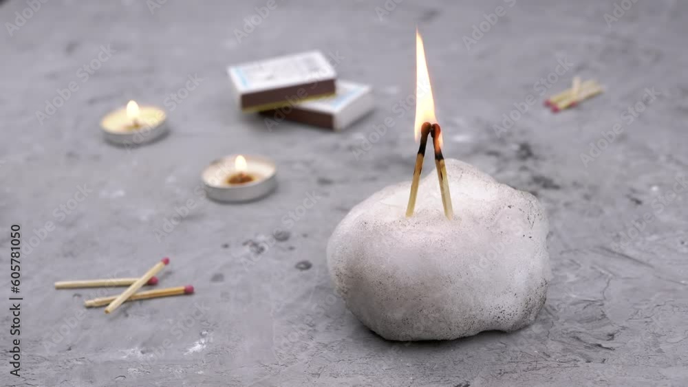 Couple of Matchsticks are Kissed in Burn Fire in the Snow on a Gray ...