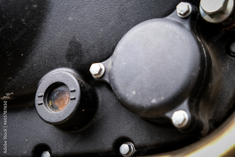 Motorcycle engine oil is seen through the oil level window Stock Photo ...