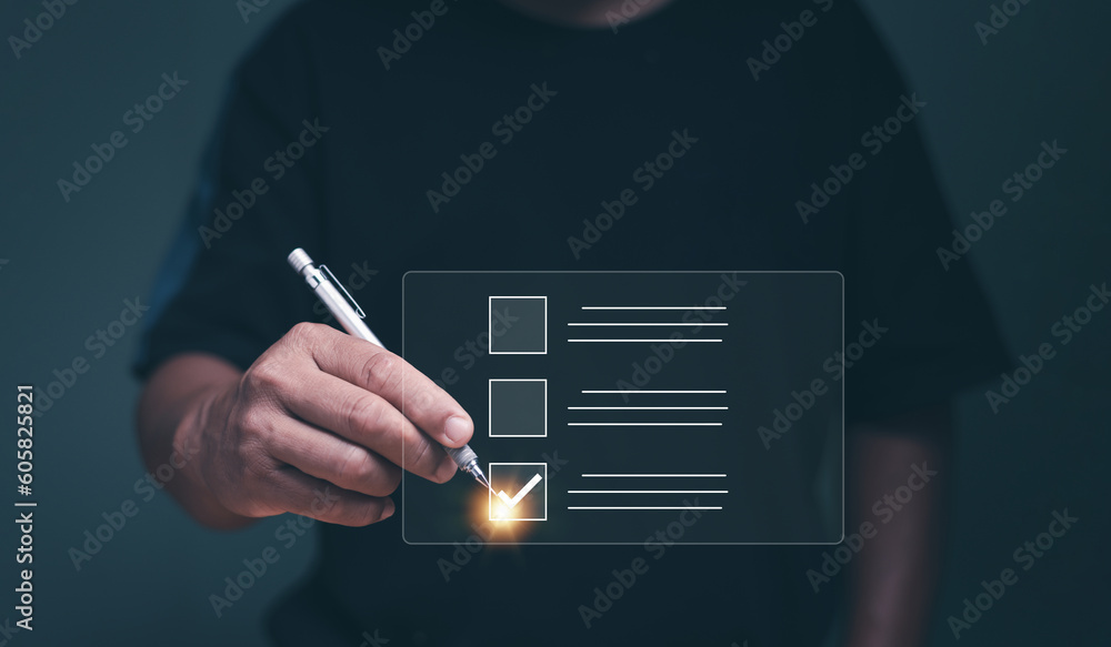 Checklist concept, Businessman checking mark on the check boxes with ...