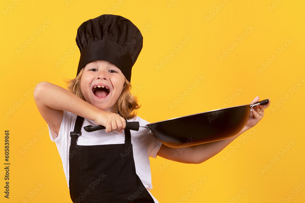 Little cook with cooking pan. Portrait of little child in uniform of ...