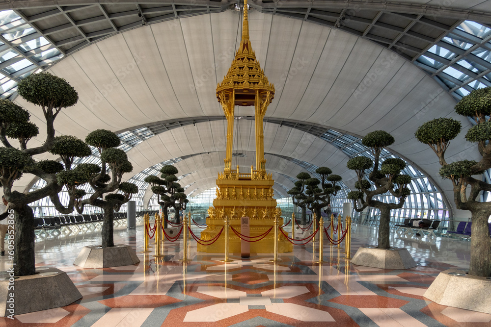 Bangkok, Thailand A Thai temple in the departure terminal at the ...