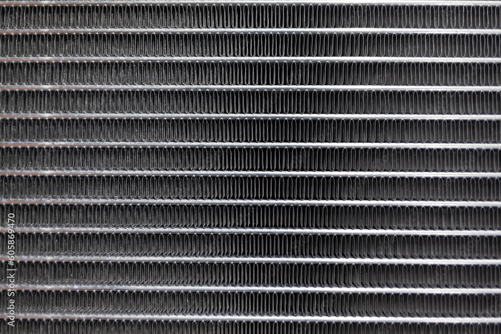 Texture of a car radiator. Engine cooler background. Vintage style ...