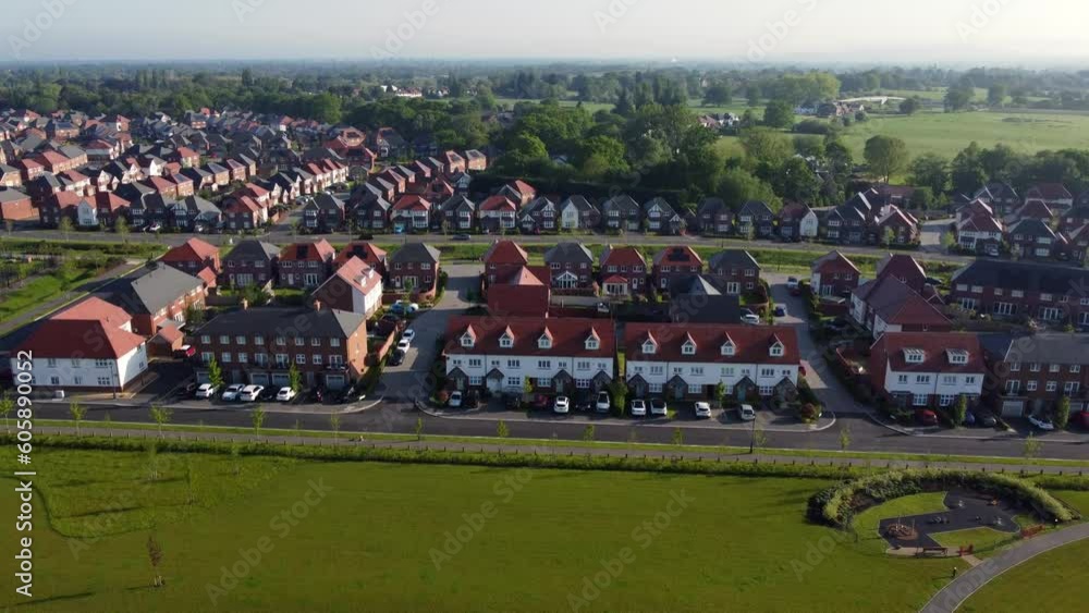 Drone aerial view of new middle-class housing estate in Cheshire ...
