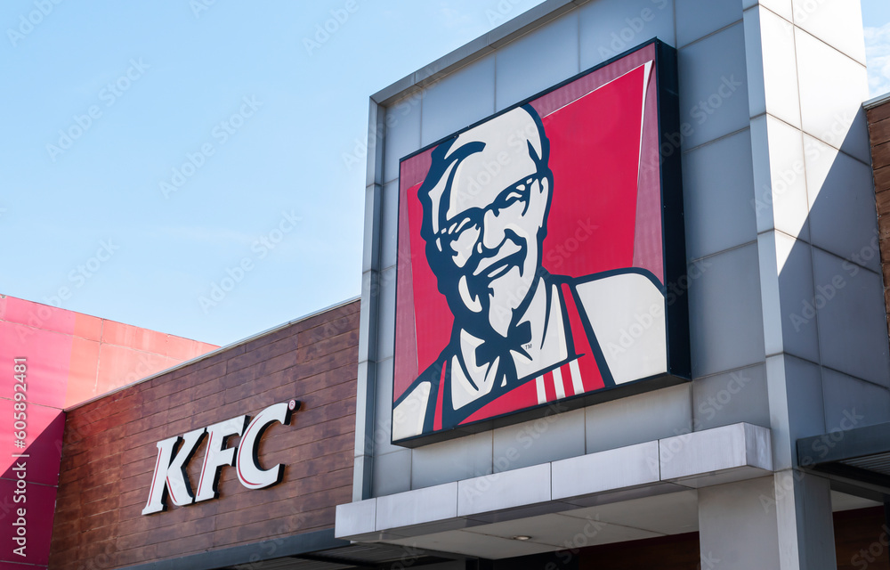 Logo KFC Brand on billboard building Stock Photo | Adobe Stock