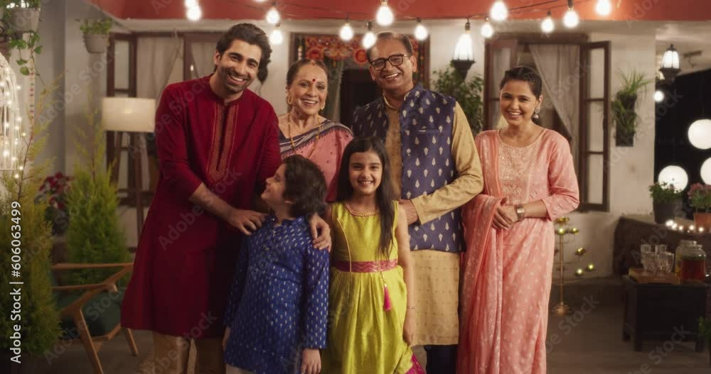 Portrait of Happy Indian Family in Traditional Clothes Laughing and ...
