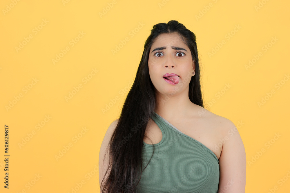 Indian Girl with Funny Weird Face Expressions foto de Stock | Adobe Stock